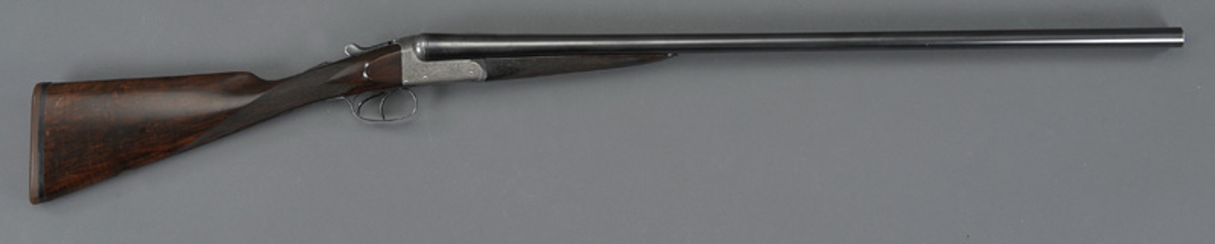 Fusil de chasse à canons juxtaposés F.T.Baker,… | Piguet