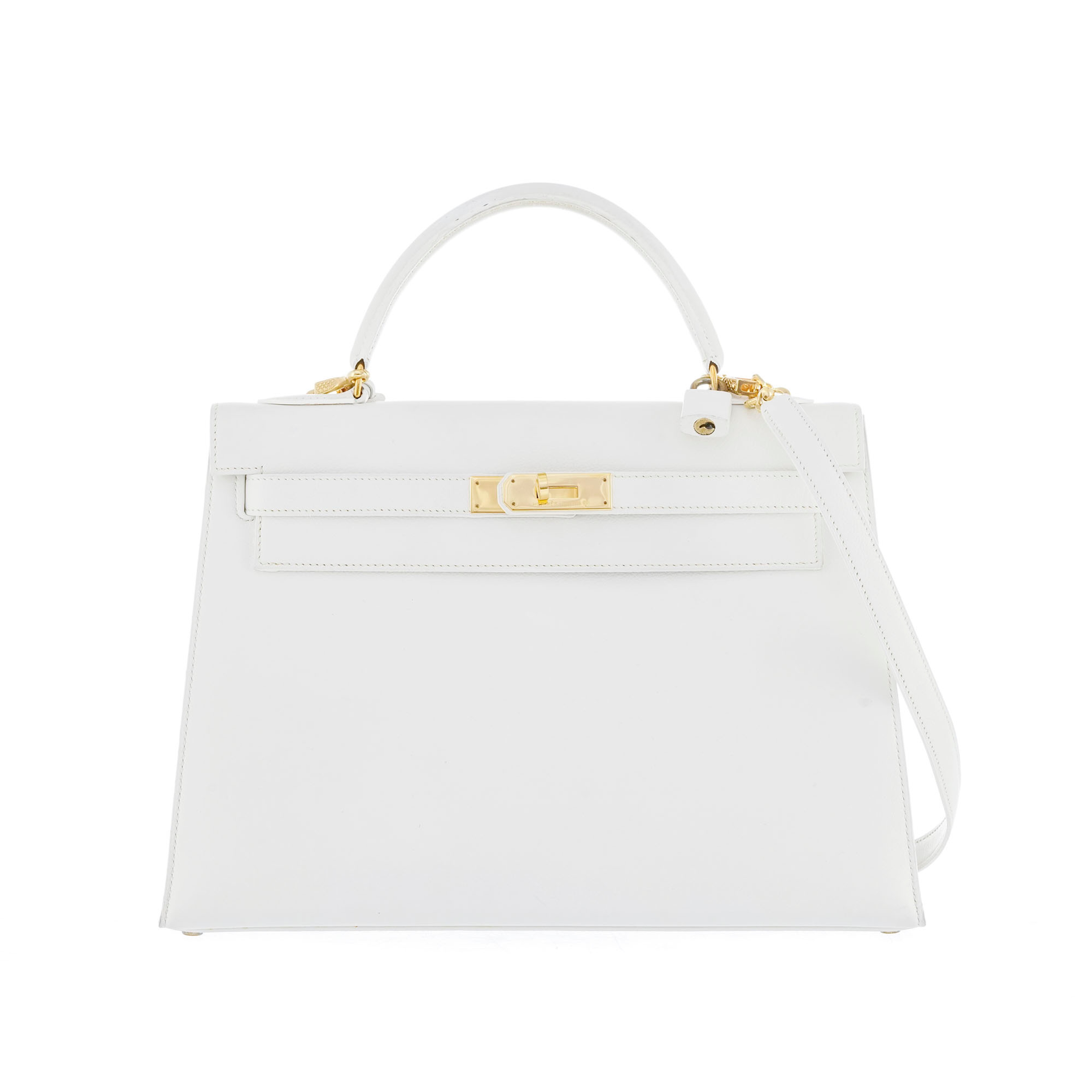 Hermès, sac Kelly 32 sellier en cuir grainé blanc,… | Piguet