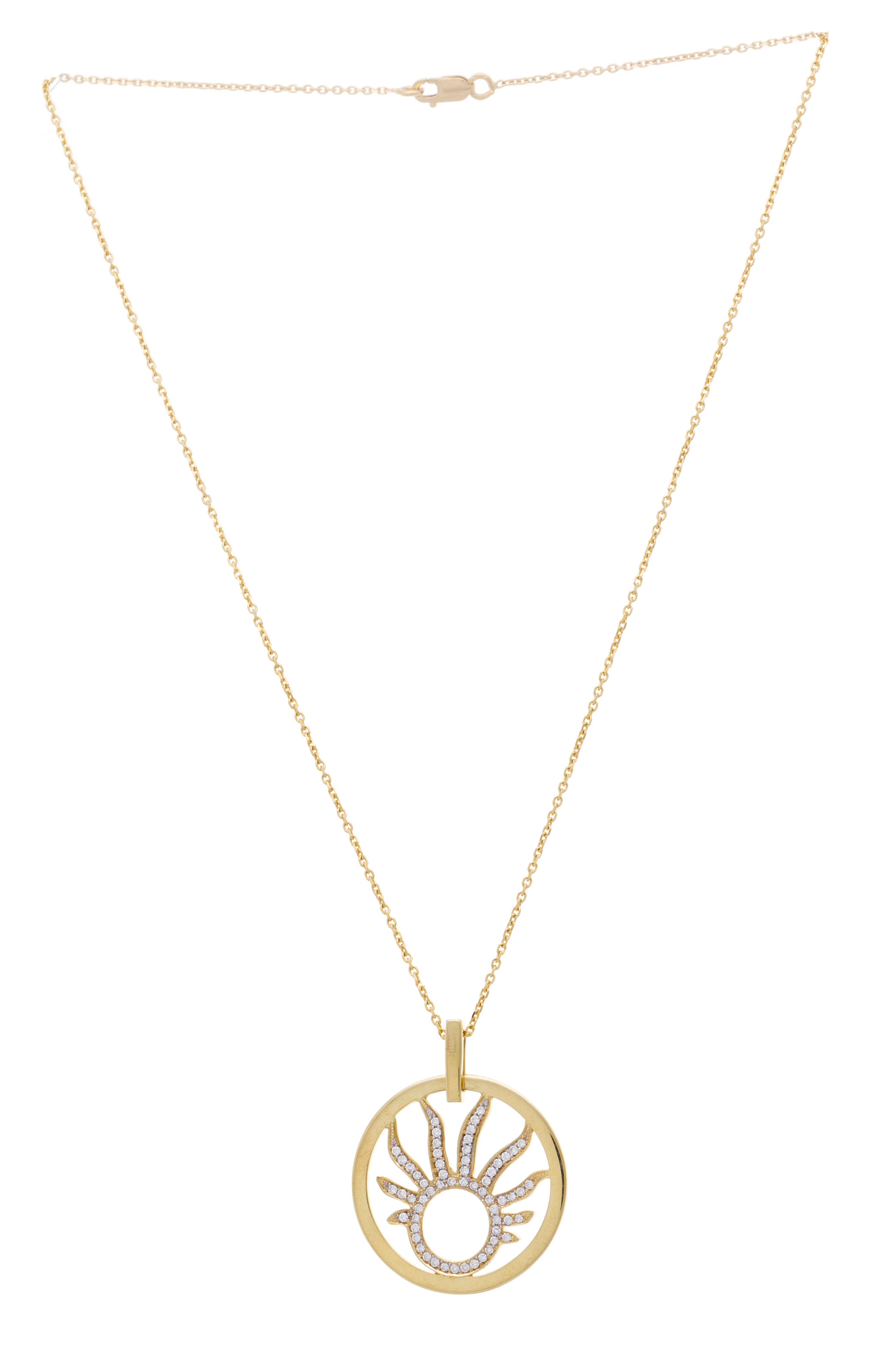 Pendentif or 585 ajouré d'un soleil serti de… | Piguet