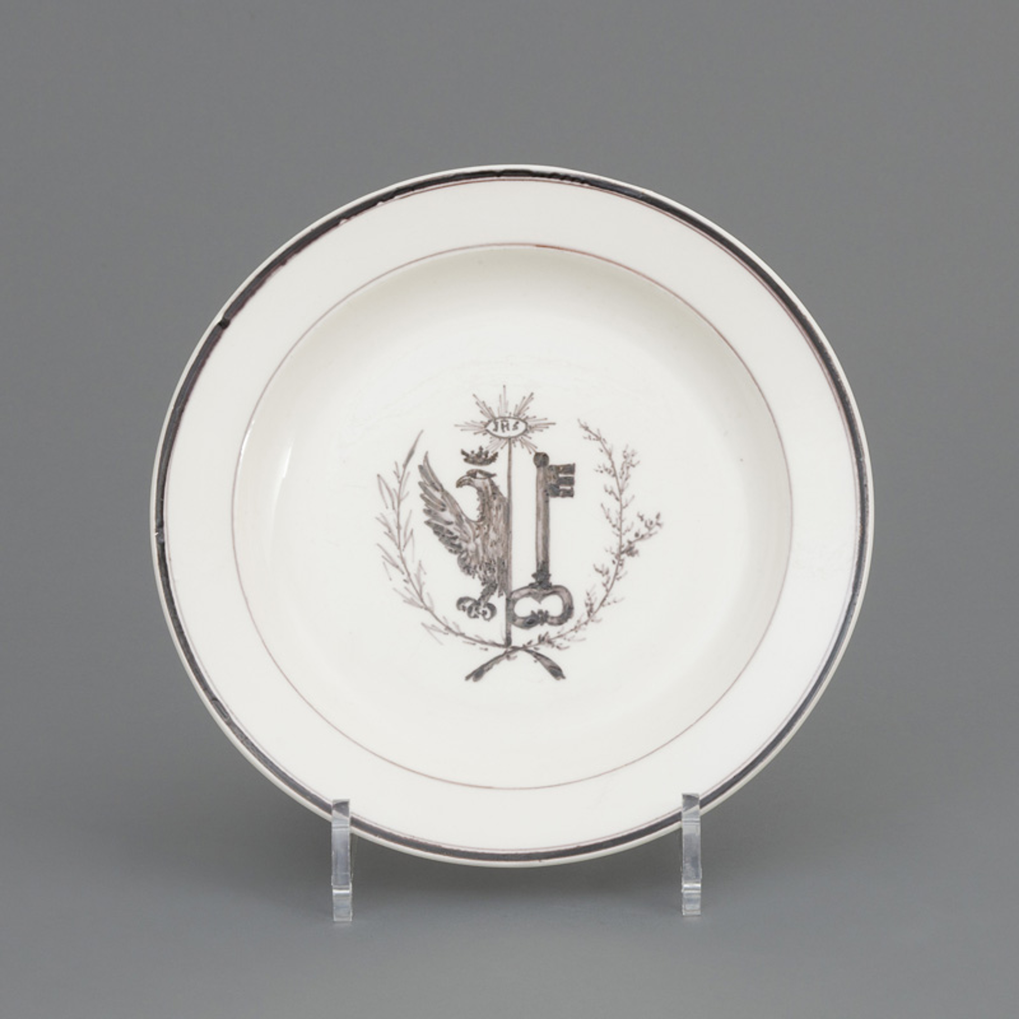 Assiette en faïence peinte aux armes de Genève,… | Piguet