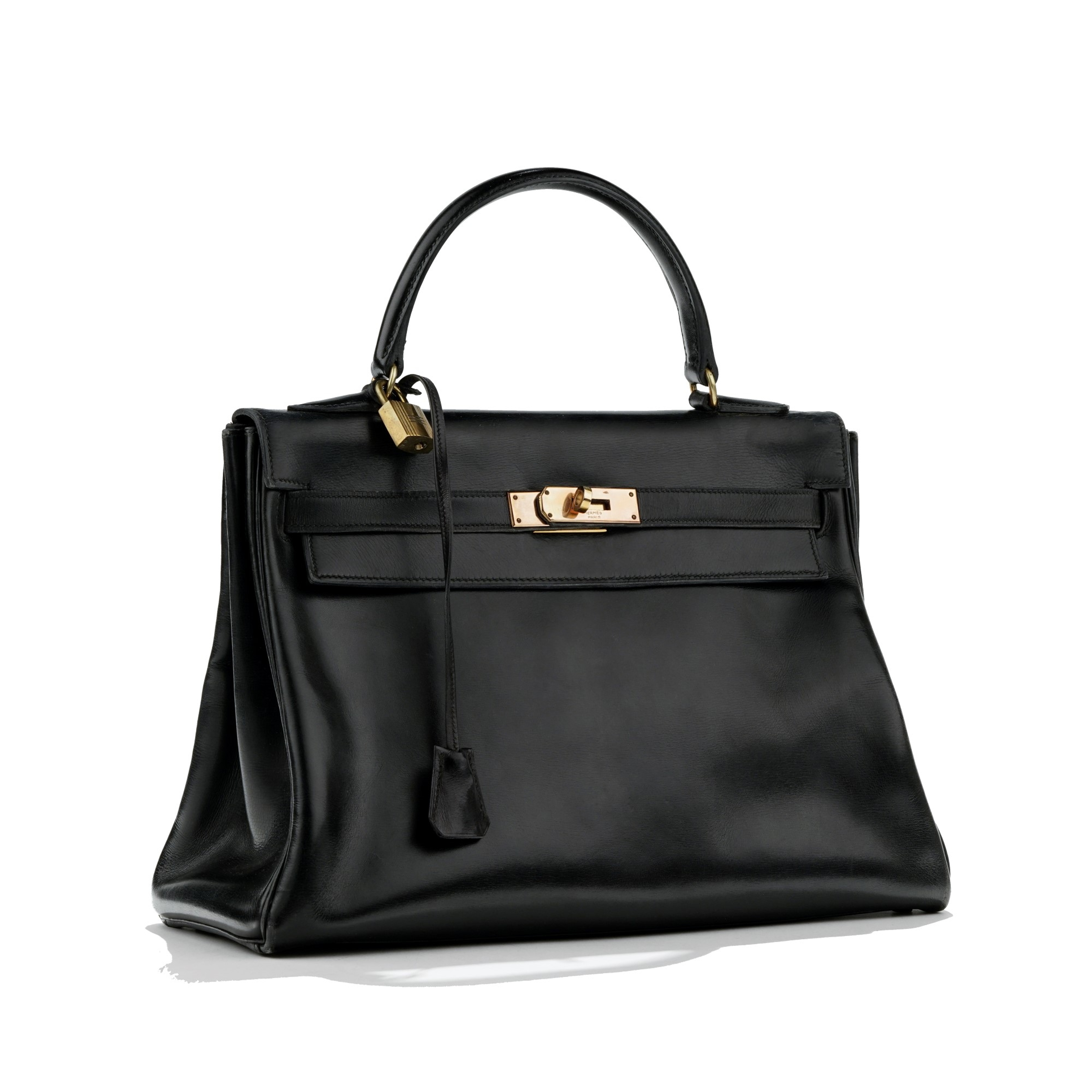 Hermès, sac Kelly 32 retourné en cuir de Box noir,… | Piguet