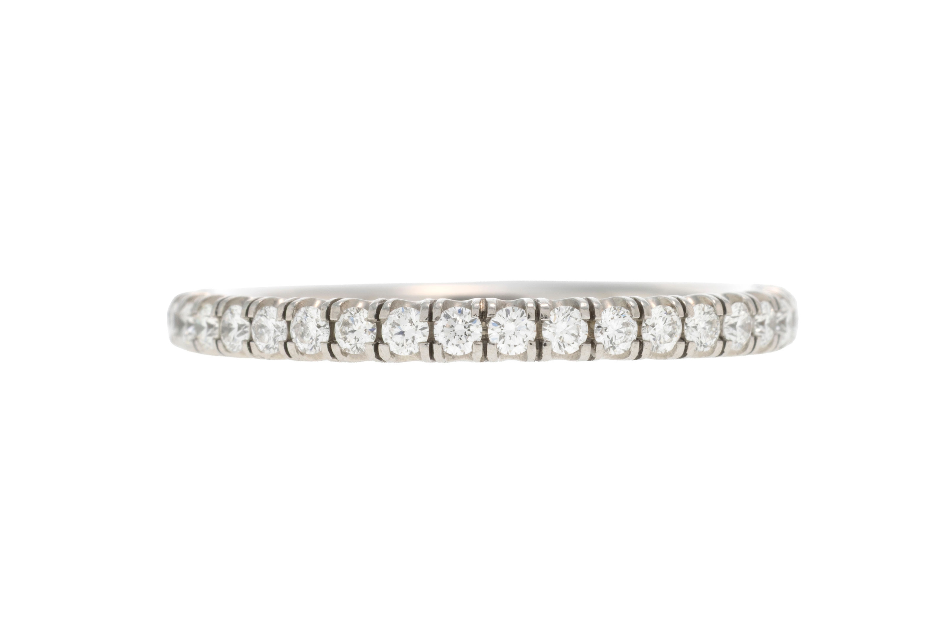 Cartier, anneau demi rivière platine serti de… | Piguet